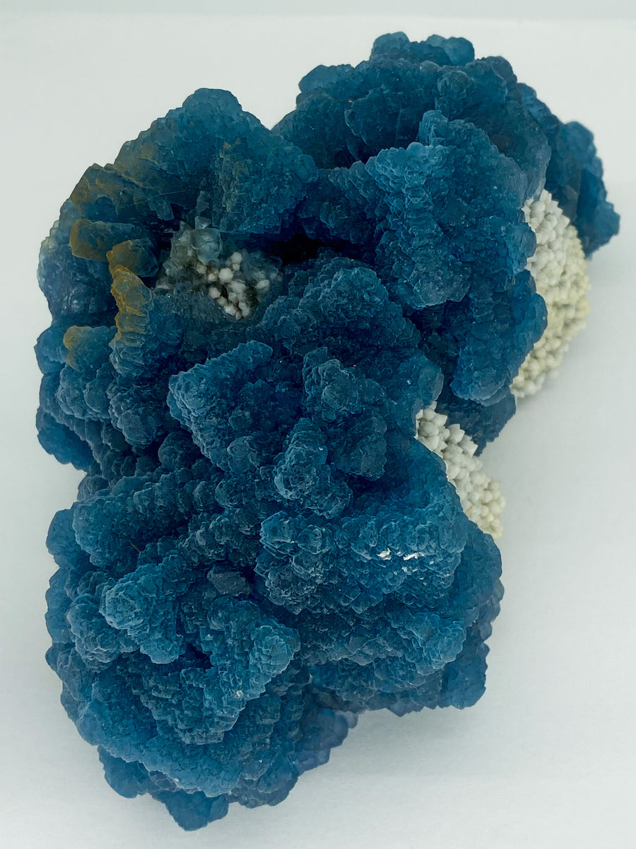 Blue Step Fluorite on Candle Quartz – Crystals and Cleavage
